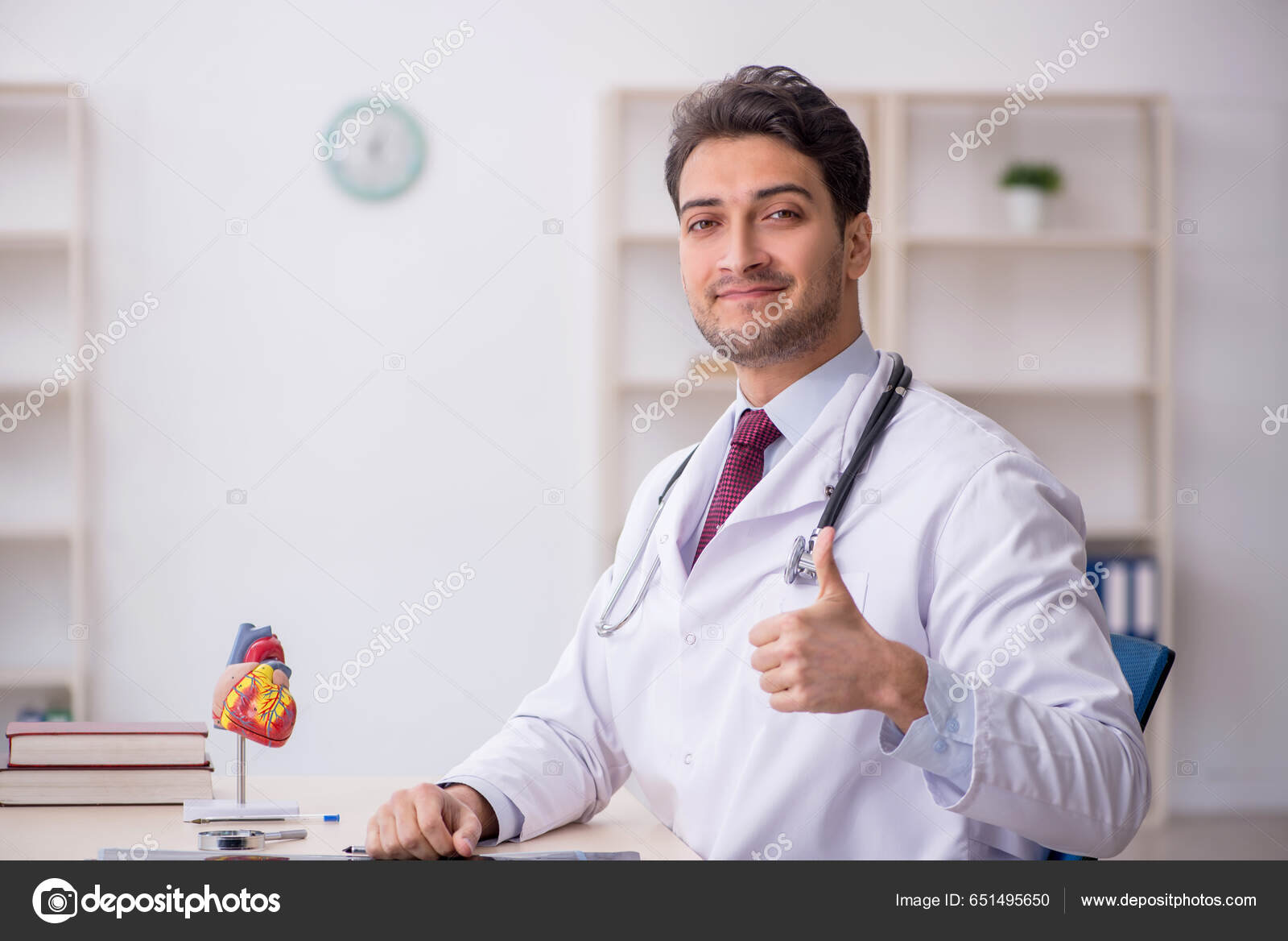 Young Doctor Cardiologist Working Clinic — Stock Photo © Elnur_ #651495650