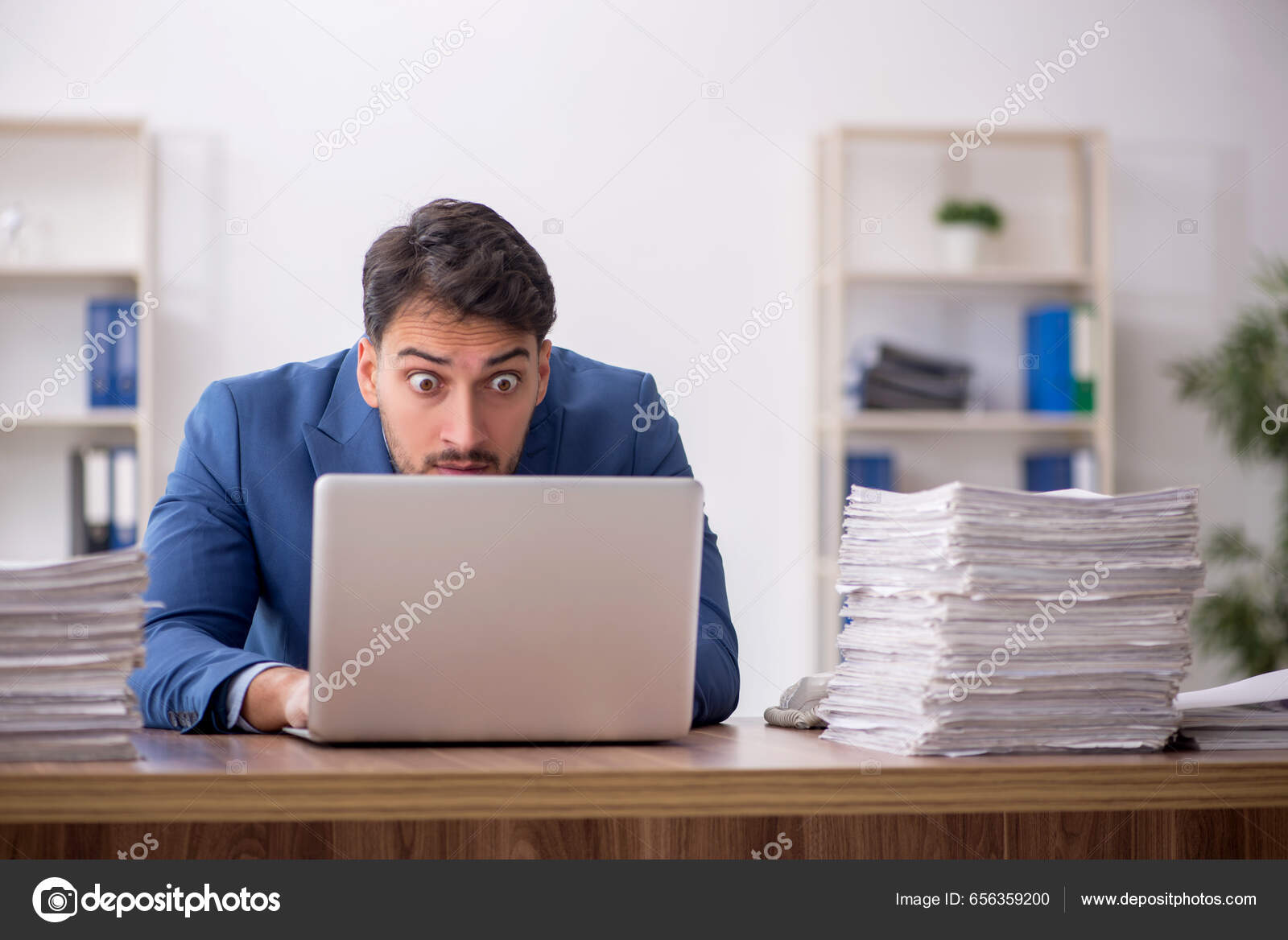 Young Employee Too Much Work Workplace — Stock Photo © Elnur_ #656359200