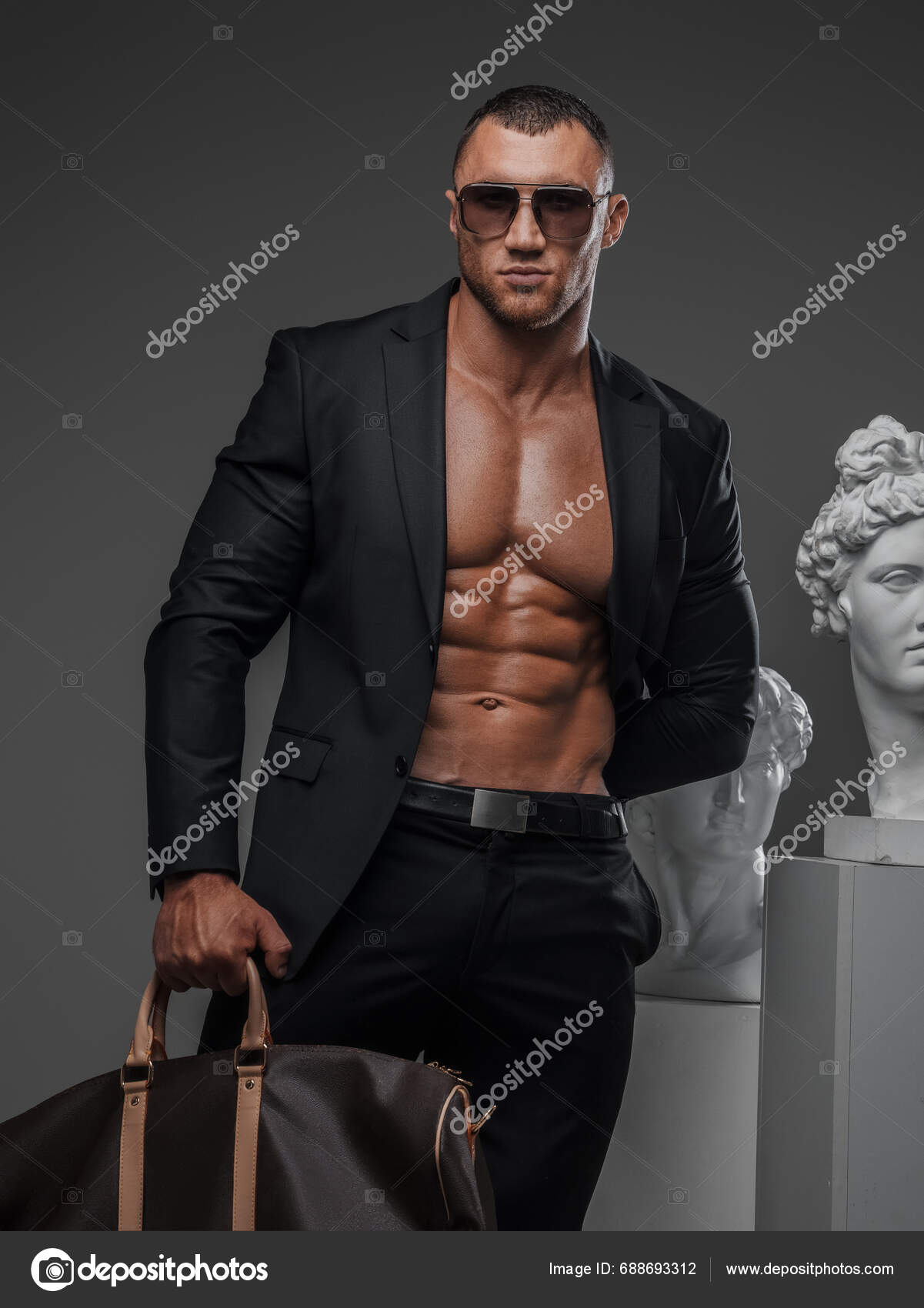 Rugged Man Sunglasses Wearing Open Suit Jacket Showcasing His Muscular ...