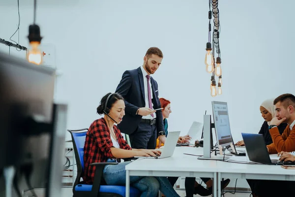 Multiethnic group of employees working in a marketing company. A group ...
