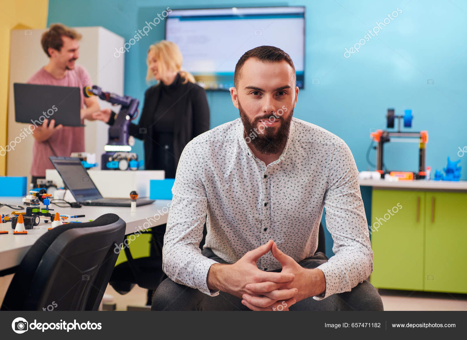 Man Sitting Robotics Laboratory While His Colleagues Background Test ...