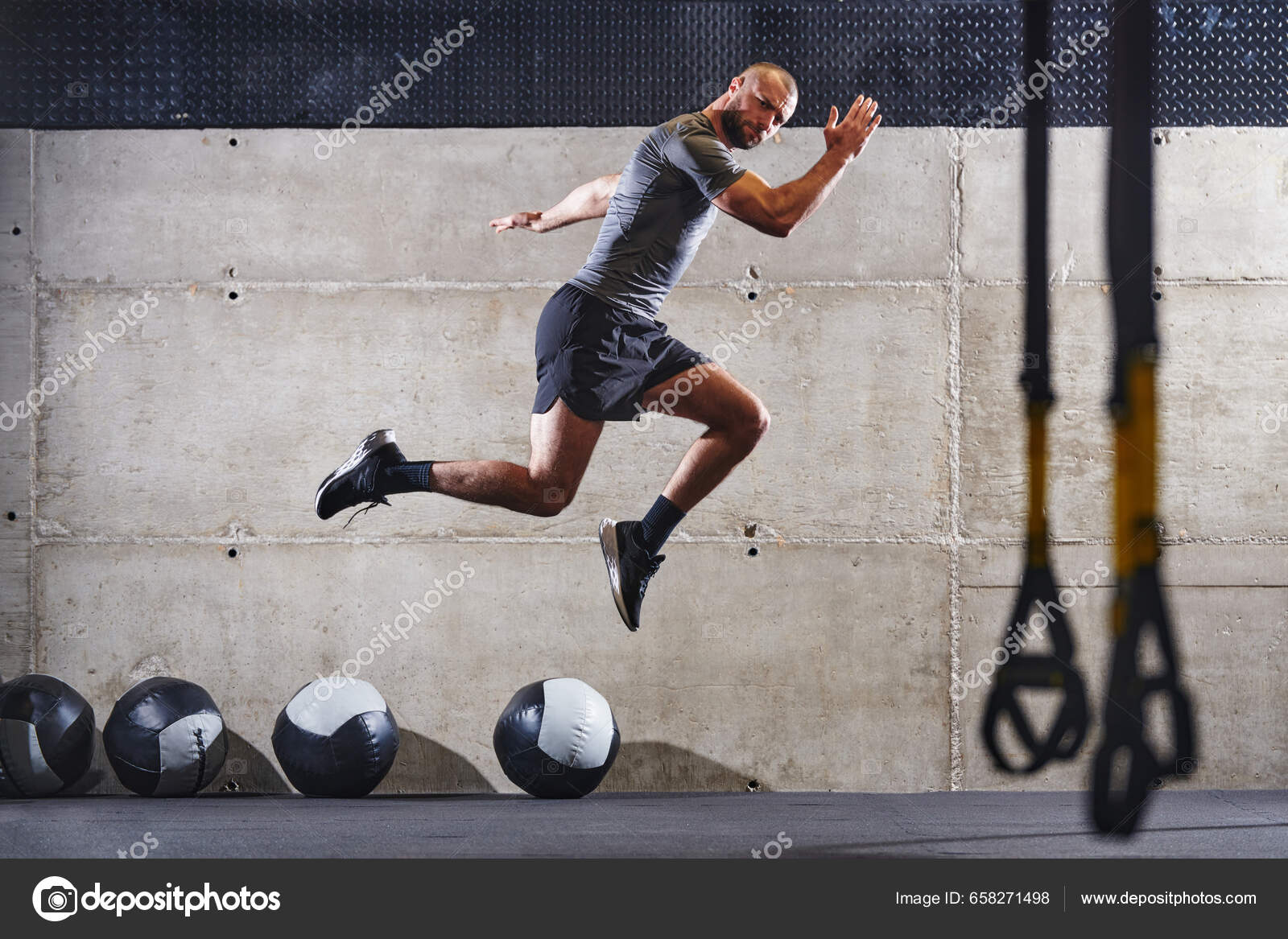 Muscular Man Captured Air Jumps Modern Gym Showcasing His Athleticism ...