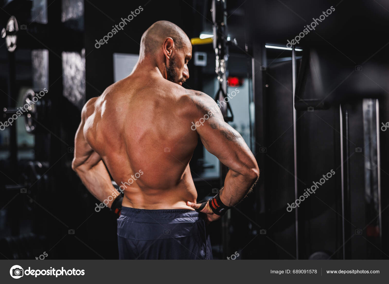 Rear View Young Muscular Bodybuilder Showing His Perfect Back Muscles ...