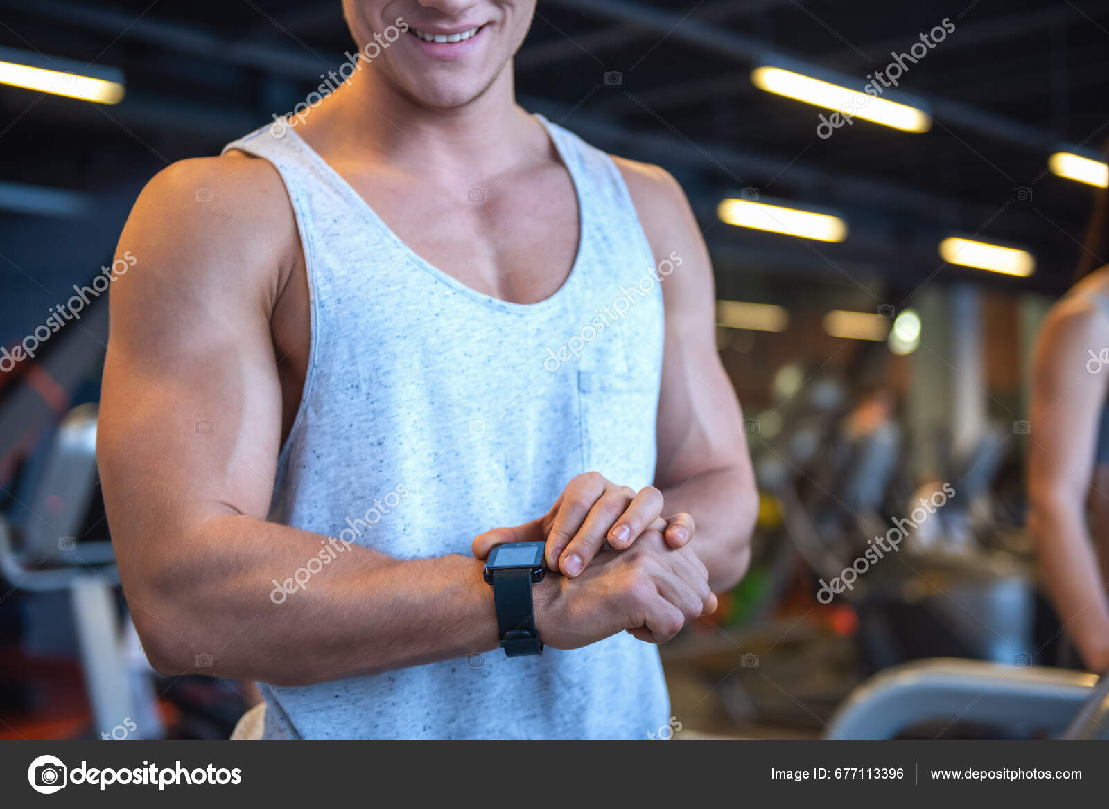 Attractive Young Muscular Man Looking His Activity Tracker Smiling ...