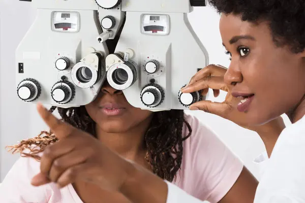 African optometrist Stock Photos, Royalty Free African optometrist Images | Depositphotos