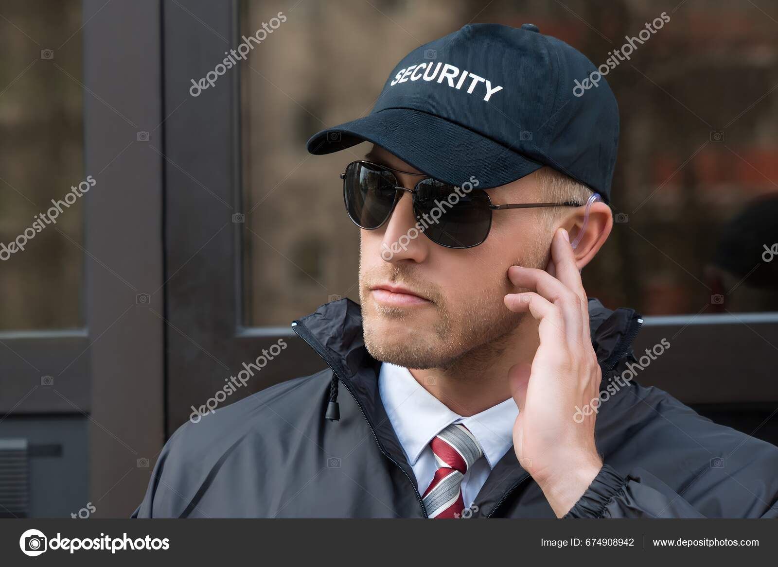 Young Security Guard Standing Front Glass Door Entrance — Stock Photo ...
