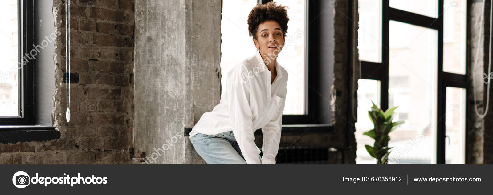 Young Black Woman Leaning Wall Looking Camera Indoors — Stock Photo ...