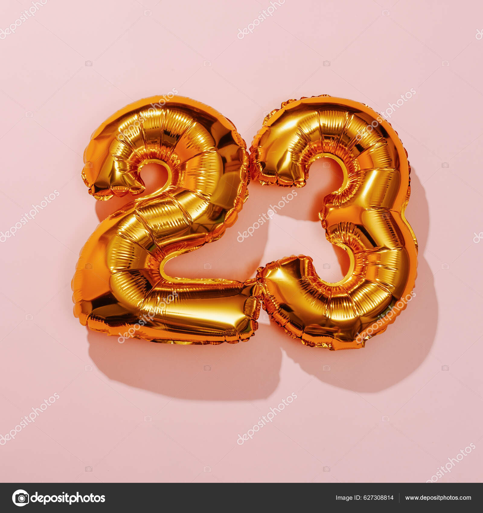 Two Golden Number Shaped Balloons Forming Number Pink Background ...