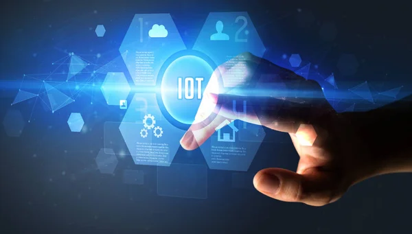 Hand touching IOT inscription, new technology concept - Stock Image ...