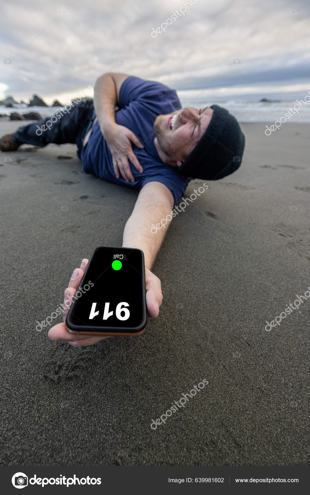 Man Trying Call 911 Collapsing Beach Holding His Chest Showing — Stock ...