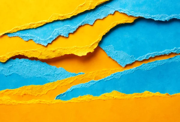 Ripped paper sheets. Background in blue and yellow colors - Stock Image ...