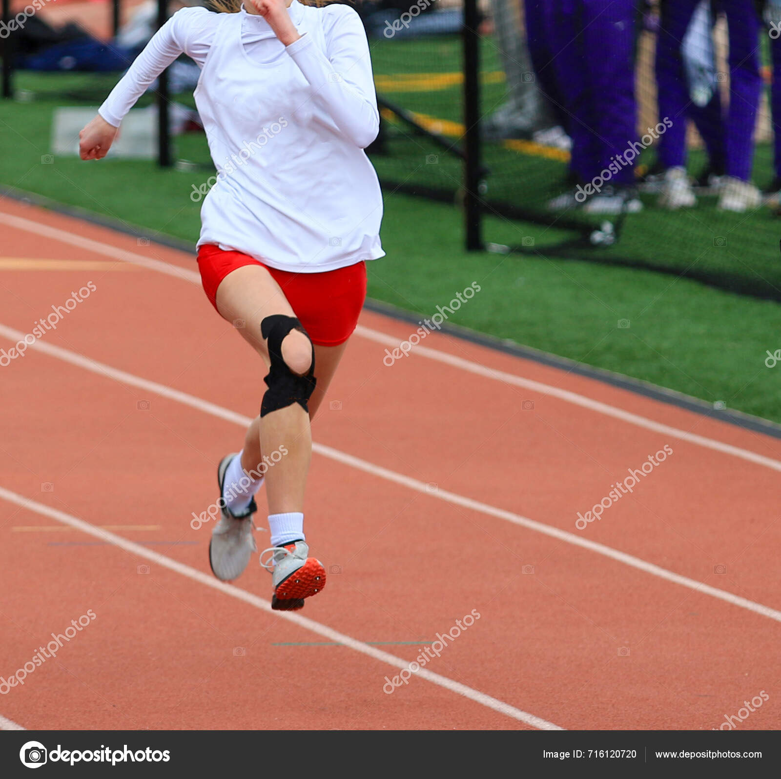 One High School Girl Running Sprint Race Track Wearing Tape — Stock ...