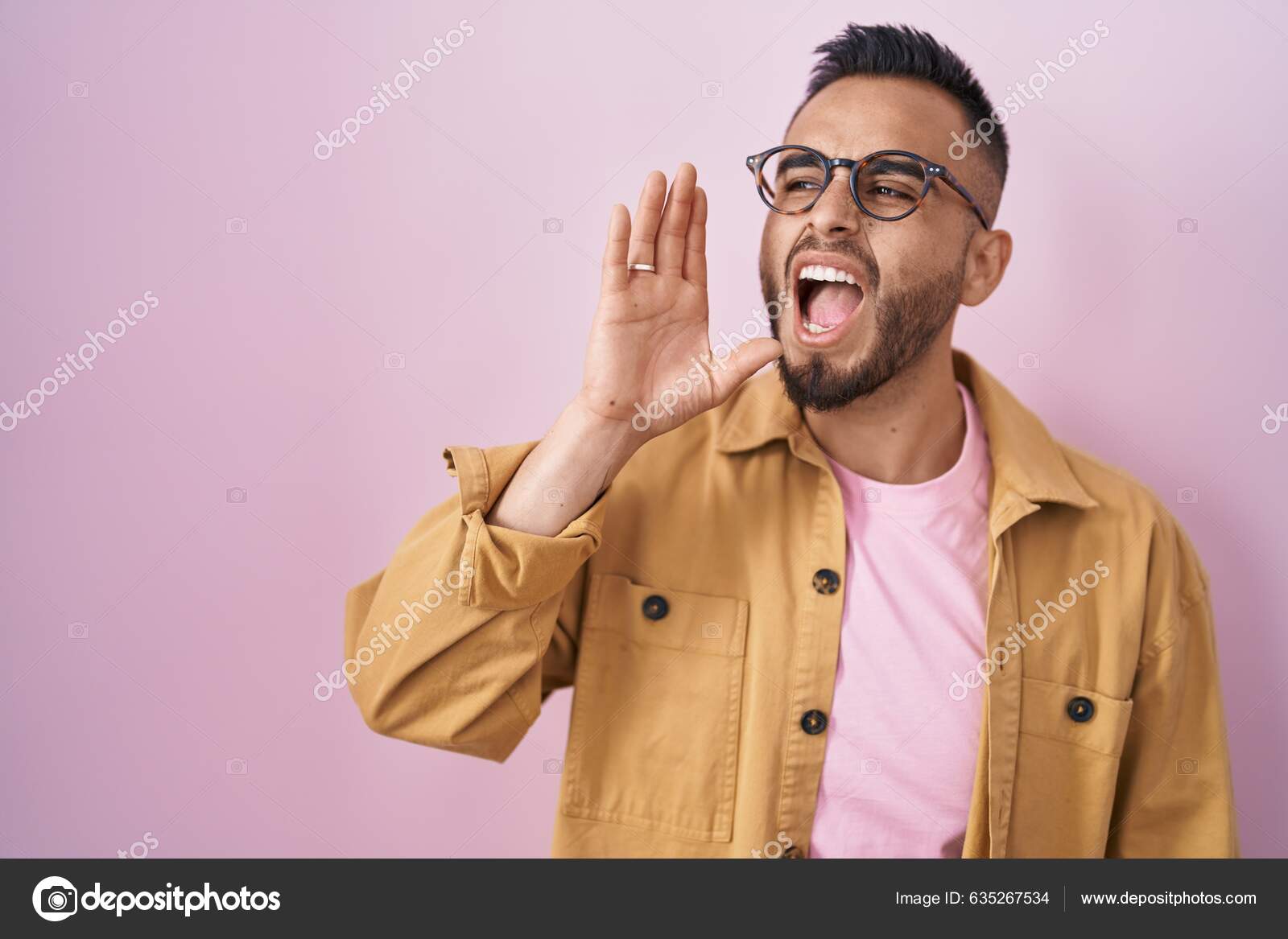Young Hispanic Man Standing Pink Background Shouting Screaming Loud ...