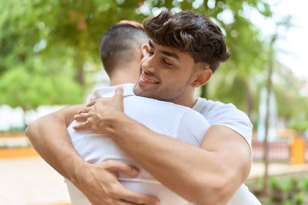 Two Guys Hugging