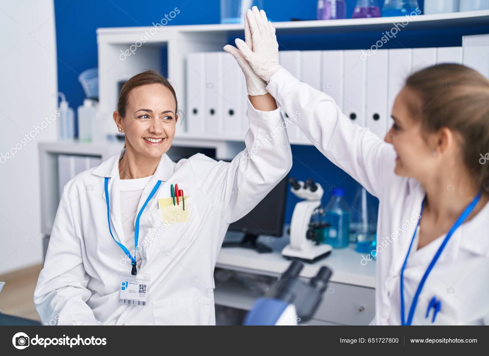 Two Women Scientists High Five Hands Raised Laboratory Stock Photo by ...