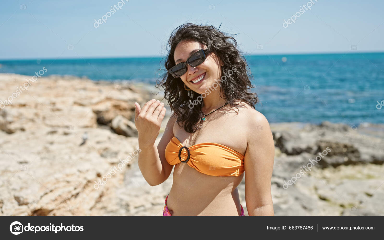Young Beautiful Hispanic Woman Tourist Wearing Bikini Doing Come ... Young Beautiful Hispanic Woman Tourist Wearing Bikini Doing Come ...
