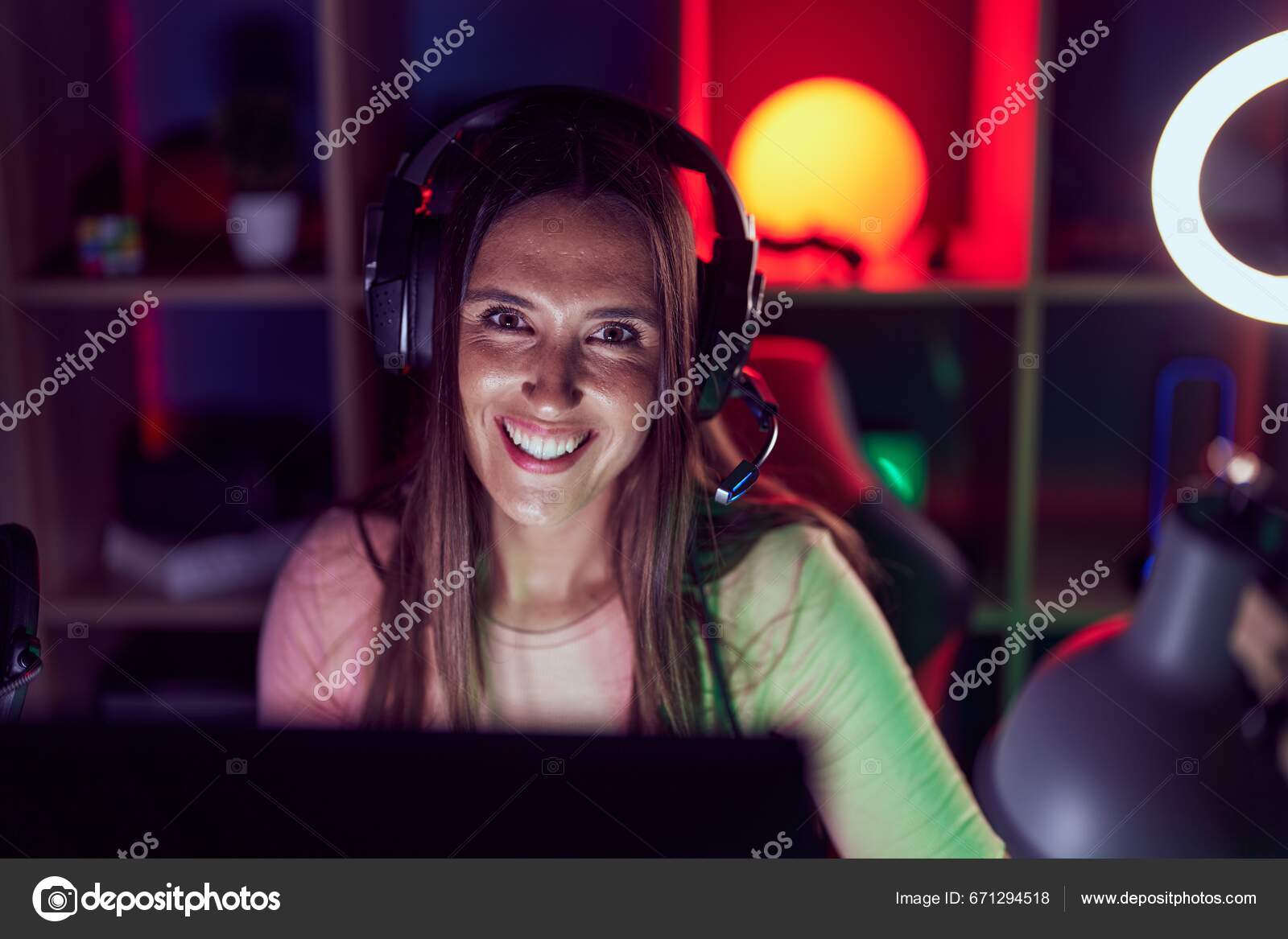 Young Beautiful Hispanic Woman Streamer Playing Video Game Using ... Young Beautiful Hispanic Woman Streamer Playing Video Game Using ...