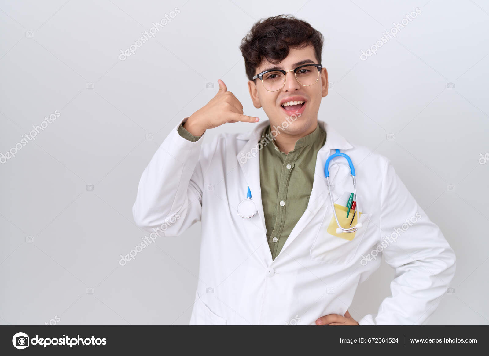 Young Non Binary Man Wearing Doctor Uniform Stethoscope Smiling Doing ...