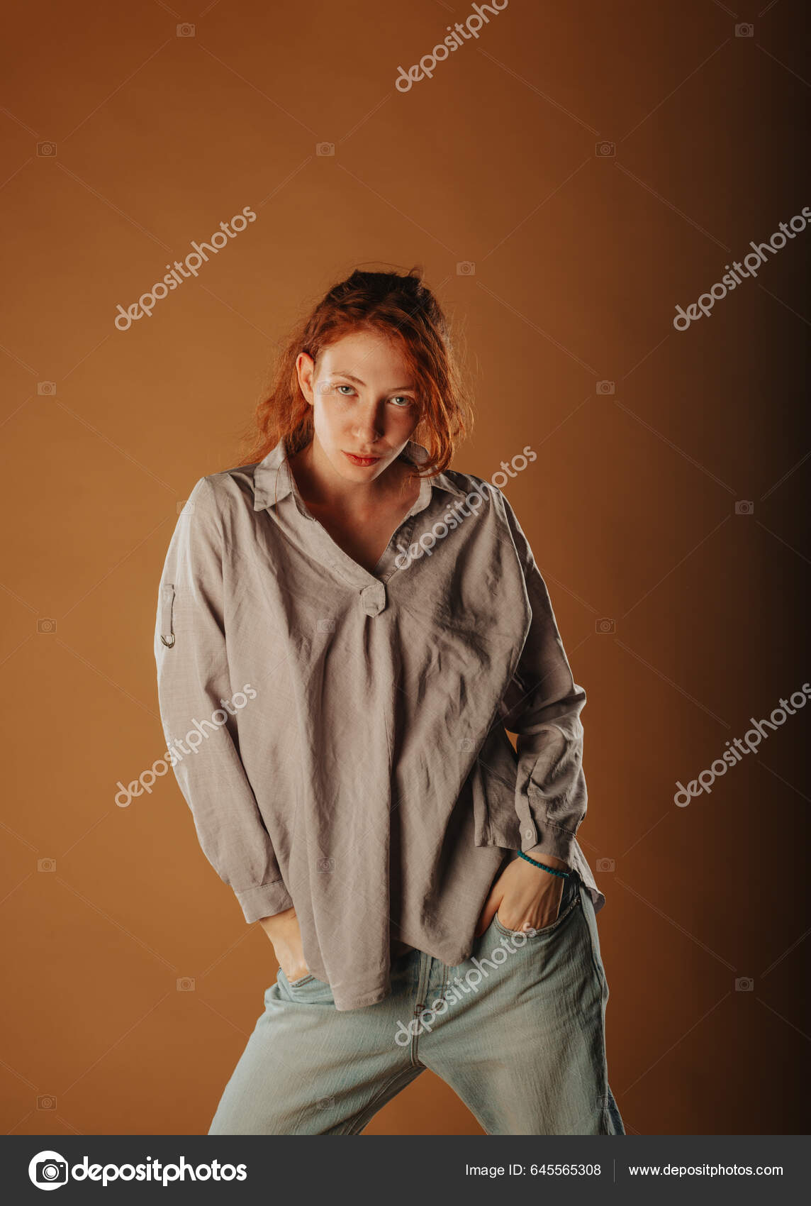 Beautiful Ginger Girl Posing While Standing Studio Her Hands Her Stock ...