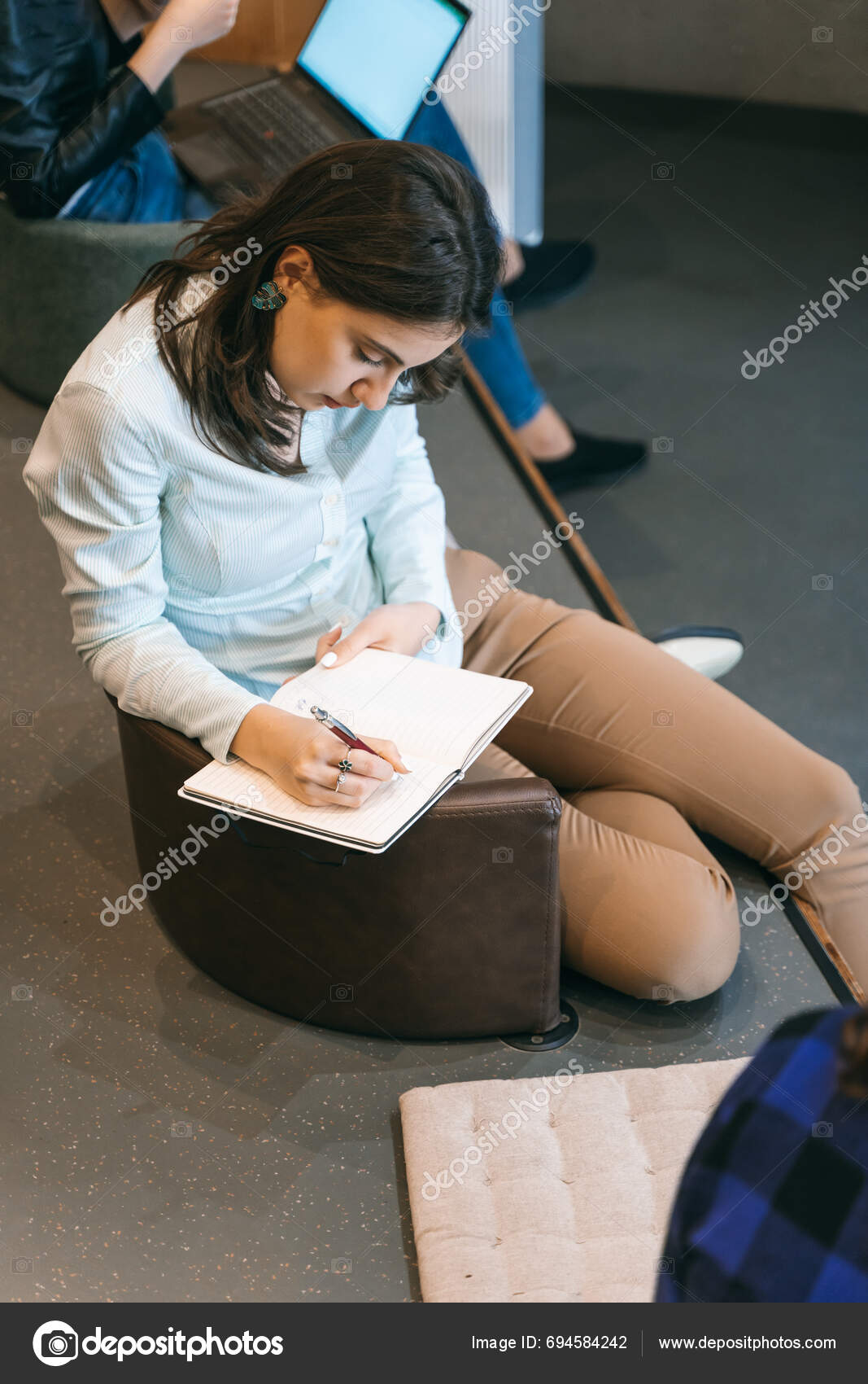 Female Employee Writing Notes Notebook Presentation Work Photo — Stock ...