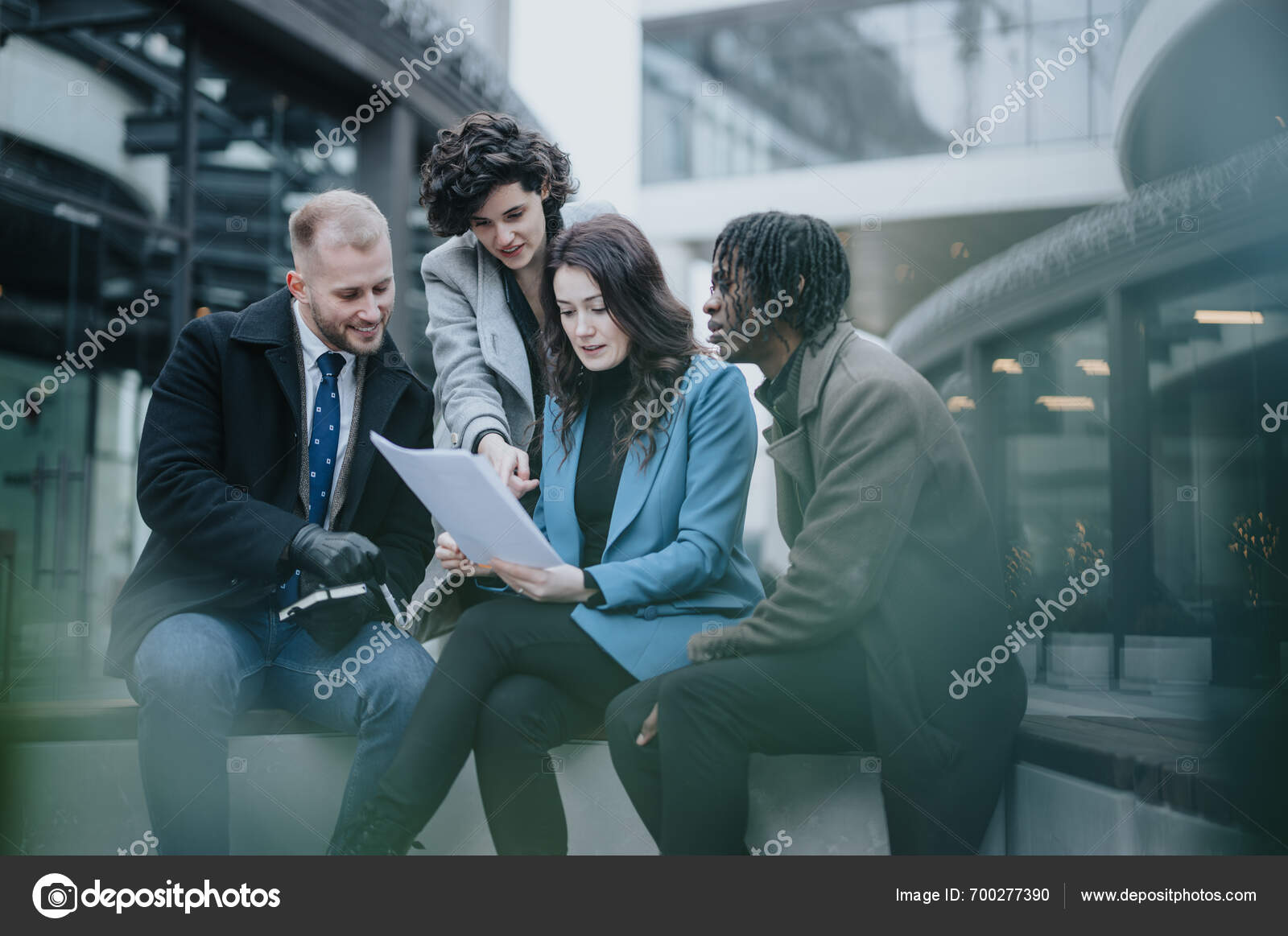 Four Business People Engaged Discussion Paperwork Office Setting ...