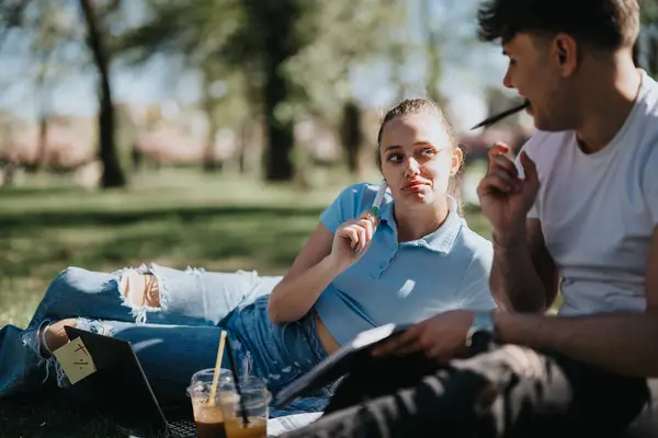 Group of high school students studying and collaborating on homework ...