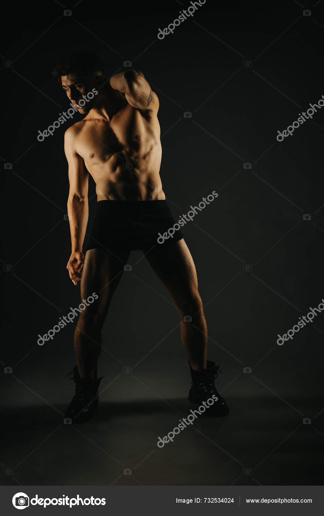 Fit Male Model Muscular Abs Arms Posing Dramatic Lighting Showcasing ...