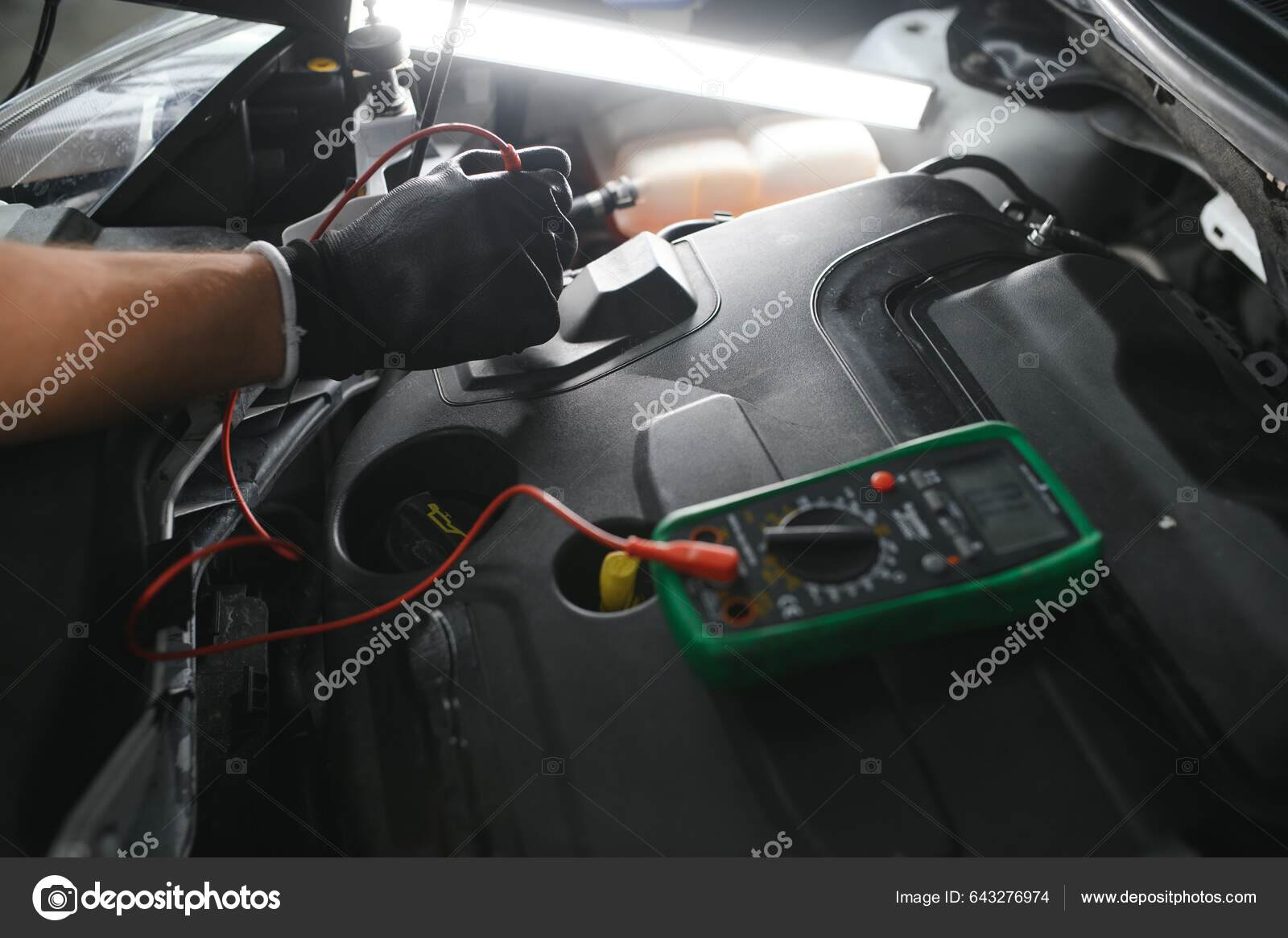 Car Mechanic Using Multimeter Voltage Range Measurement Check Voltage ...