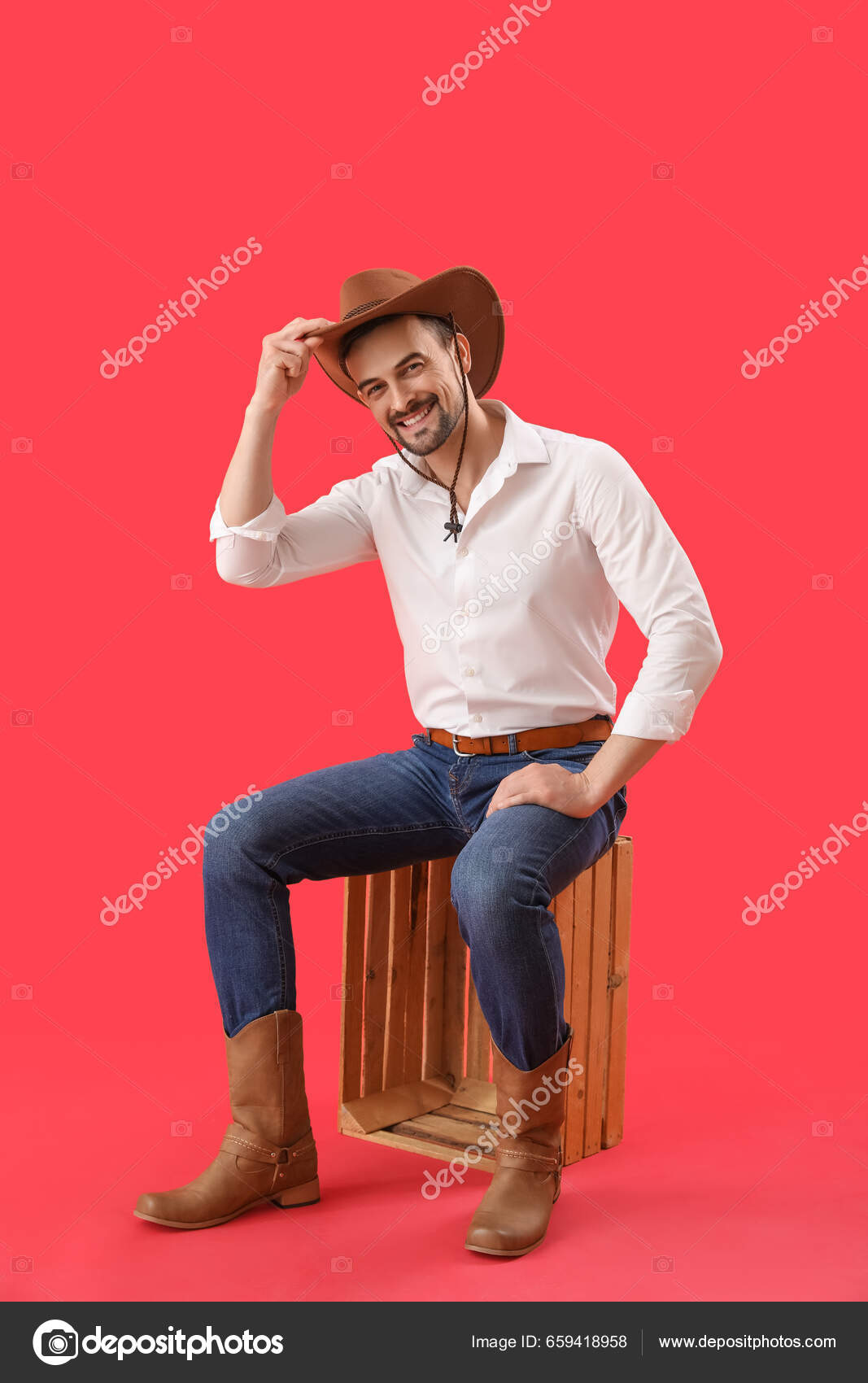 Handsome Cowboy Sitting Red Background — Stock Photo © serezniy #659418958