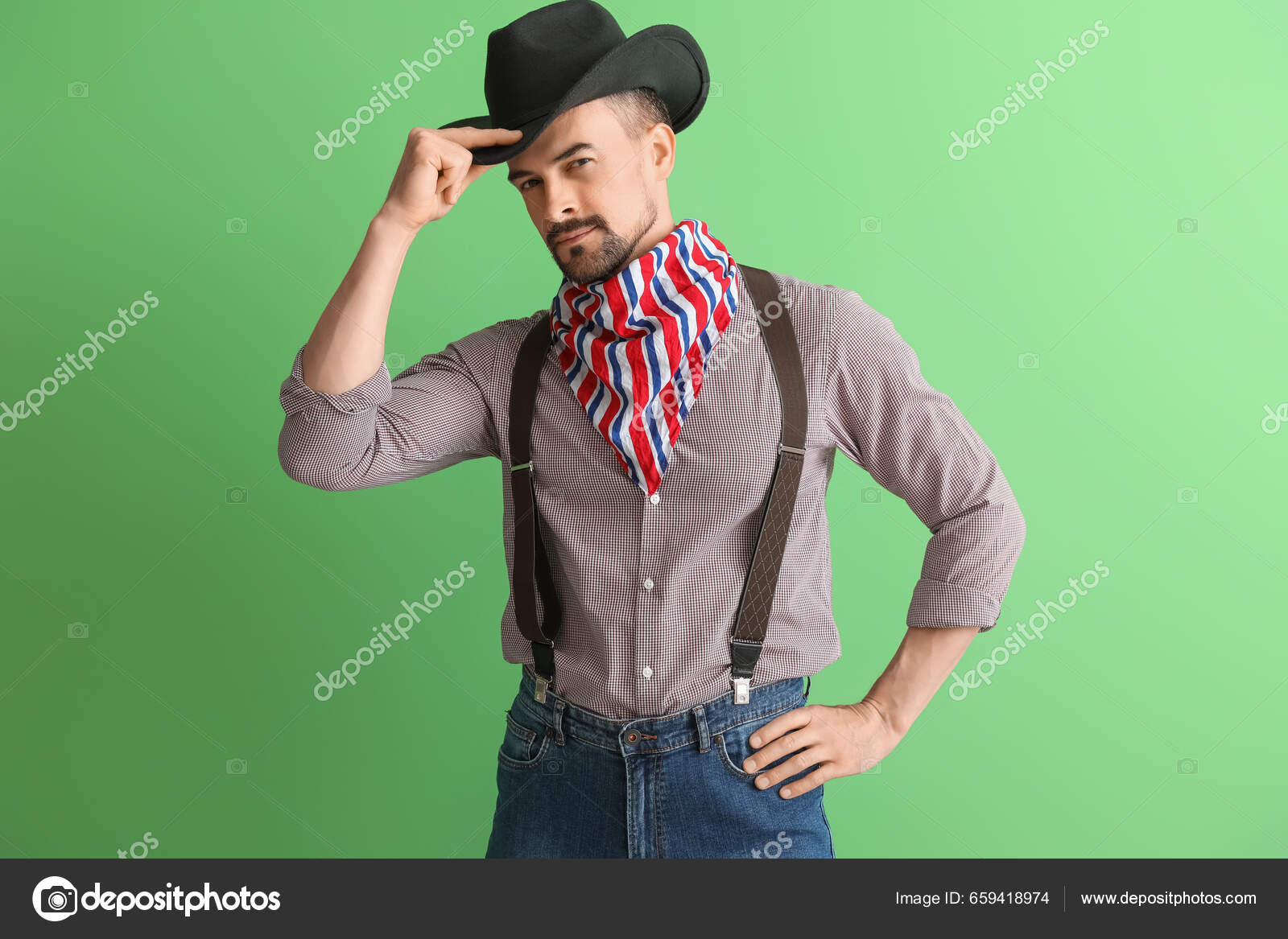 Handsome Cowboy Green Background Stock Photo by ©serezniy 659418974