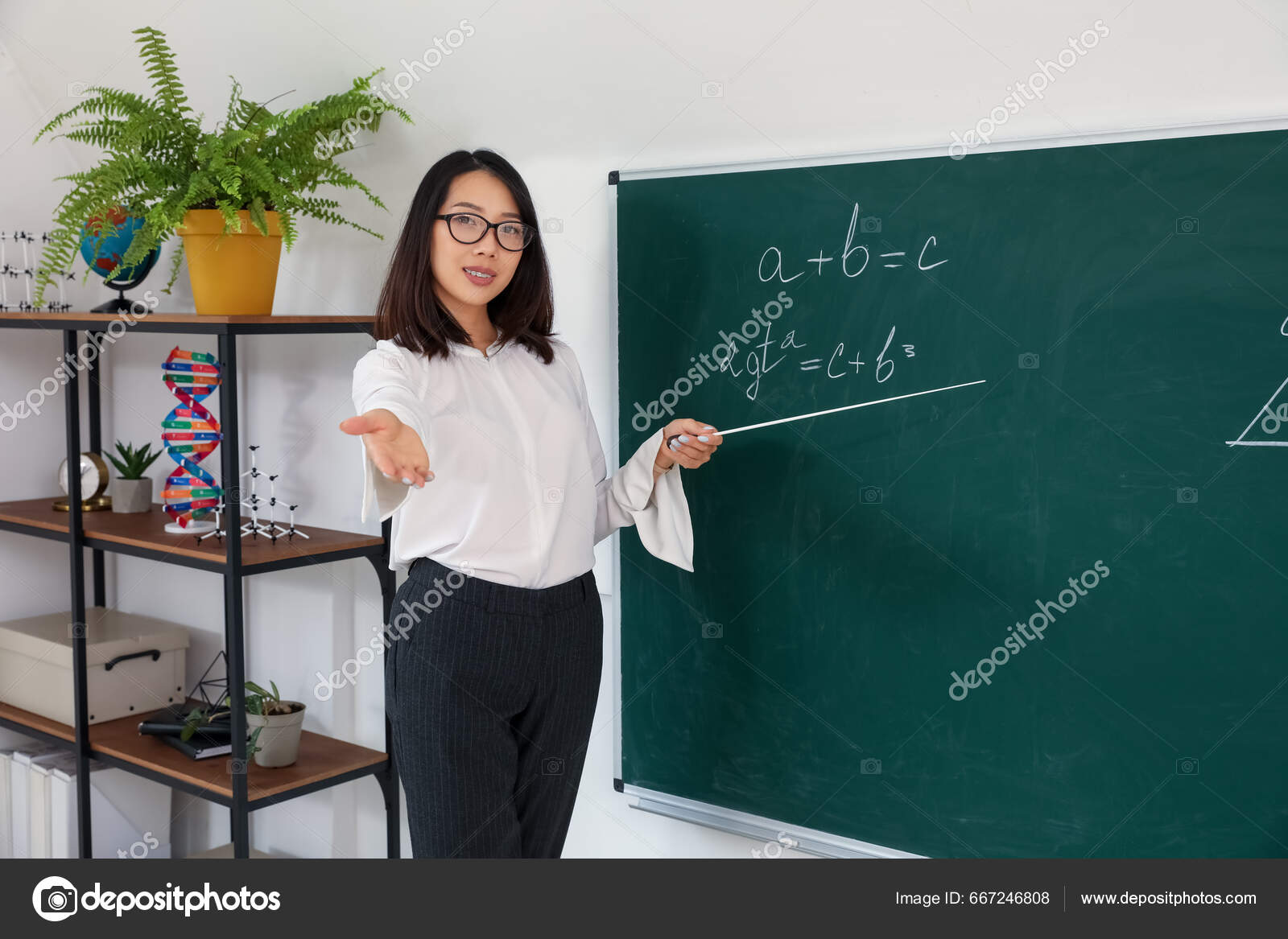 Female Asian Teacher Conducting Math Chalkboard Classroom Stock Photo ...