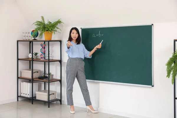 Female Asian Teacher Conducting Math Chalkboard Classroom — Stock Photo ...