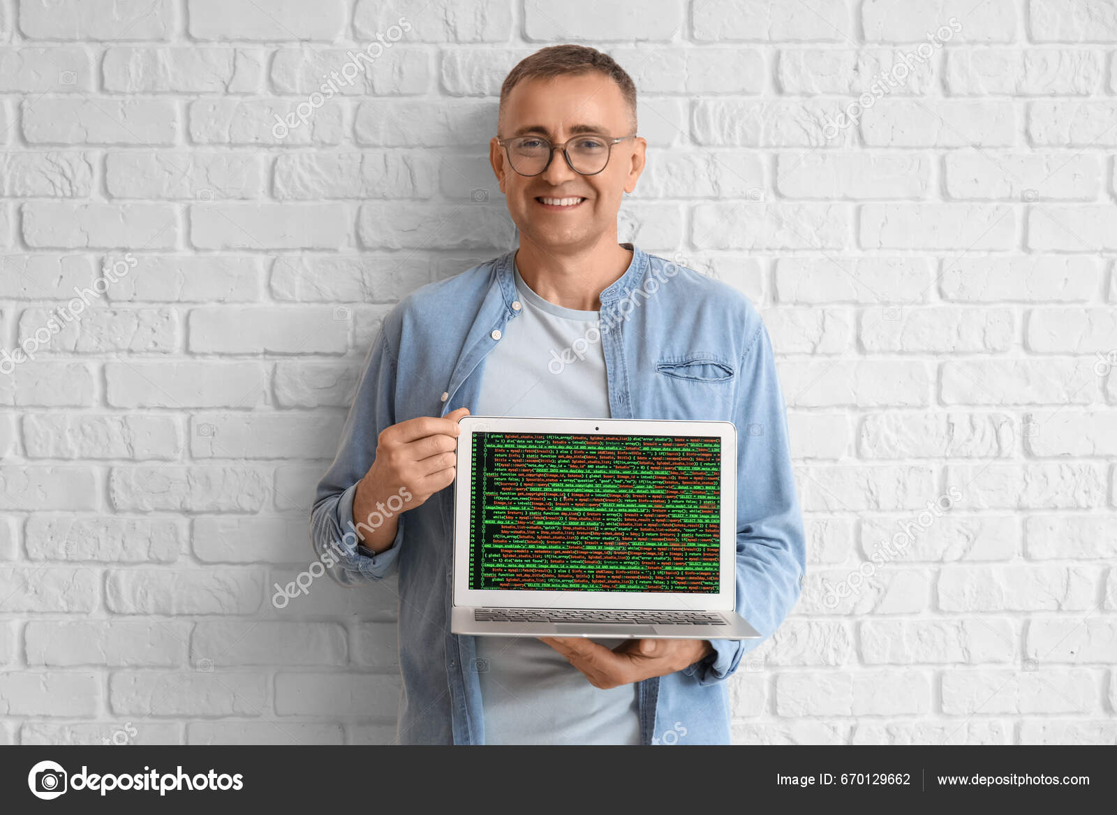 Mature Male Programmer Holding Laptop Programming Code White Brick Wall — Stock Photo © serezniy ...