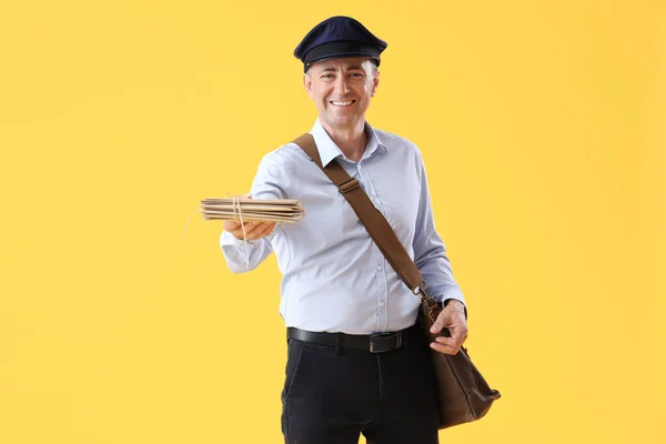 Mature Postman Envelopes Yellow Background Stock Photo by ©serezniy ...