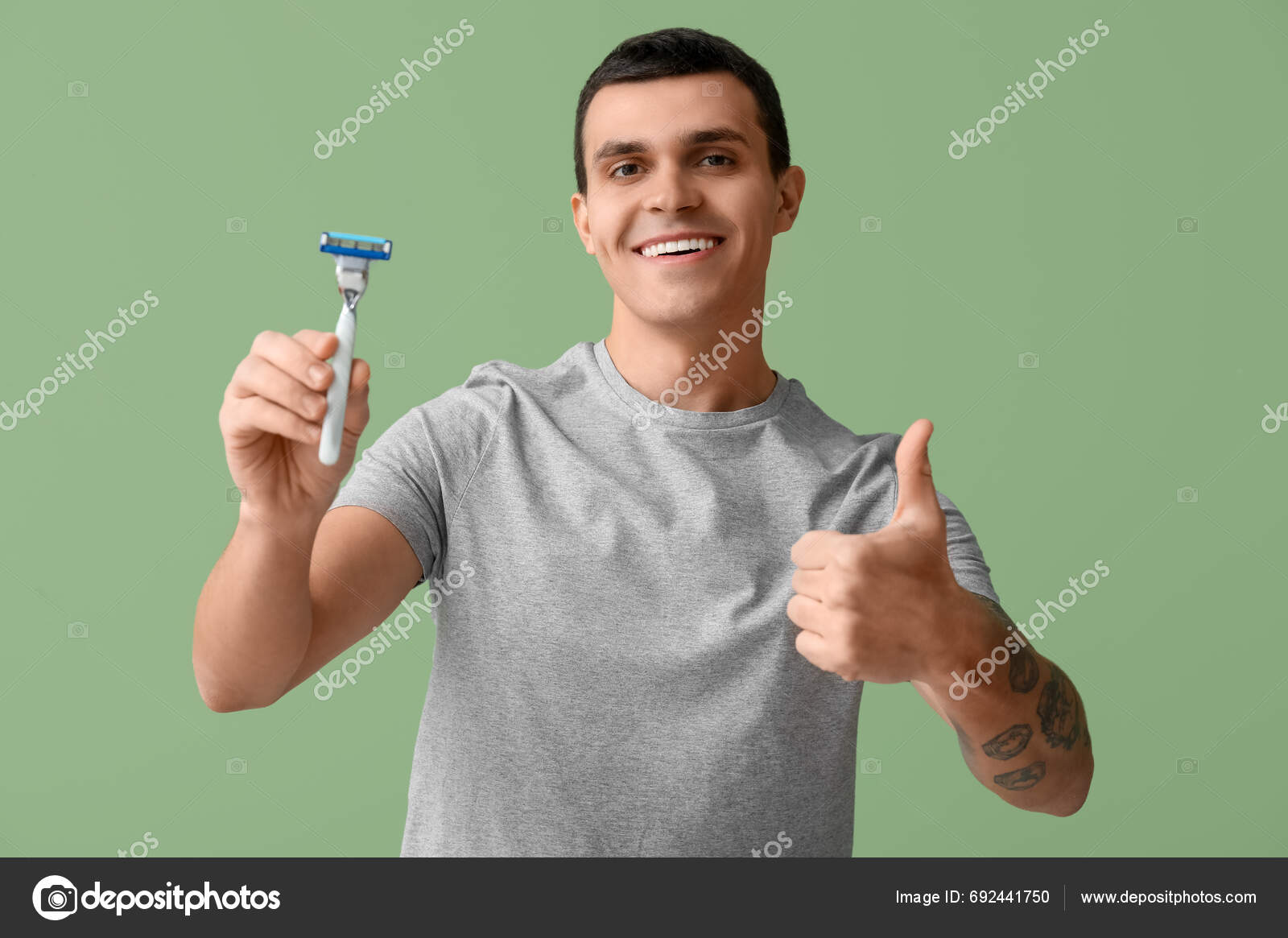 Handsome Young Man Shaving Razor Showing Thumb Gesture Green Background ...