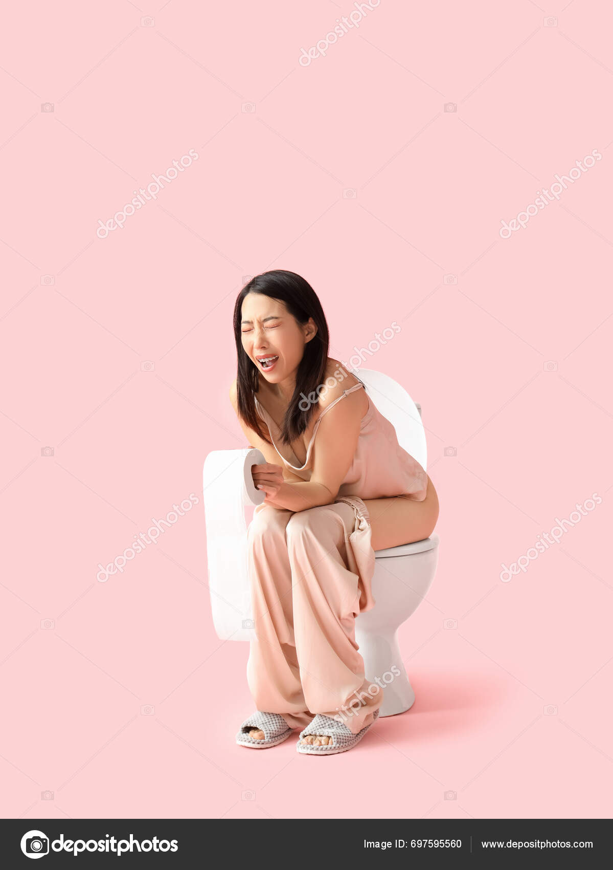 Young Asian Woman Pajamas Hemorrhoids Sitting Toilet Bowl Pink