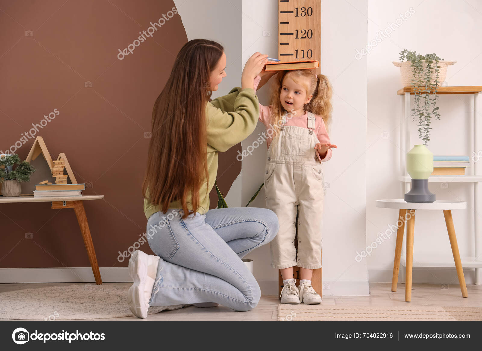 Young Mother Measuring Height Her Little Daughter Wooden Stadiometer ...