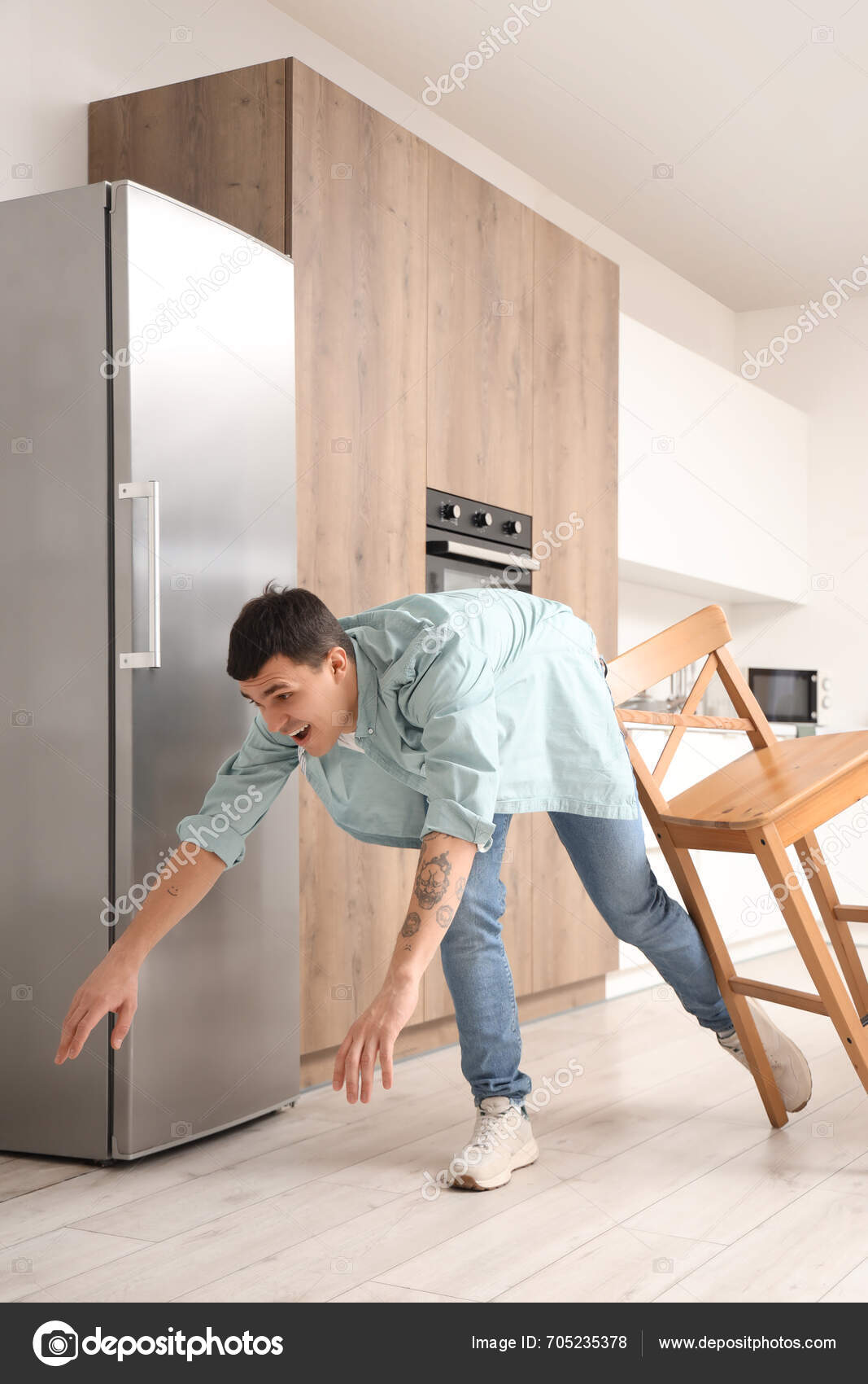 Young Man Tripping Chair Kitchen Trauma Concept — Stock Photo ...