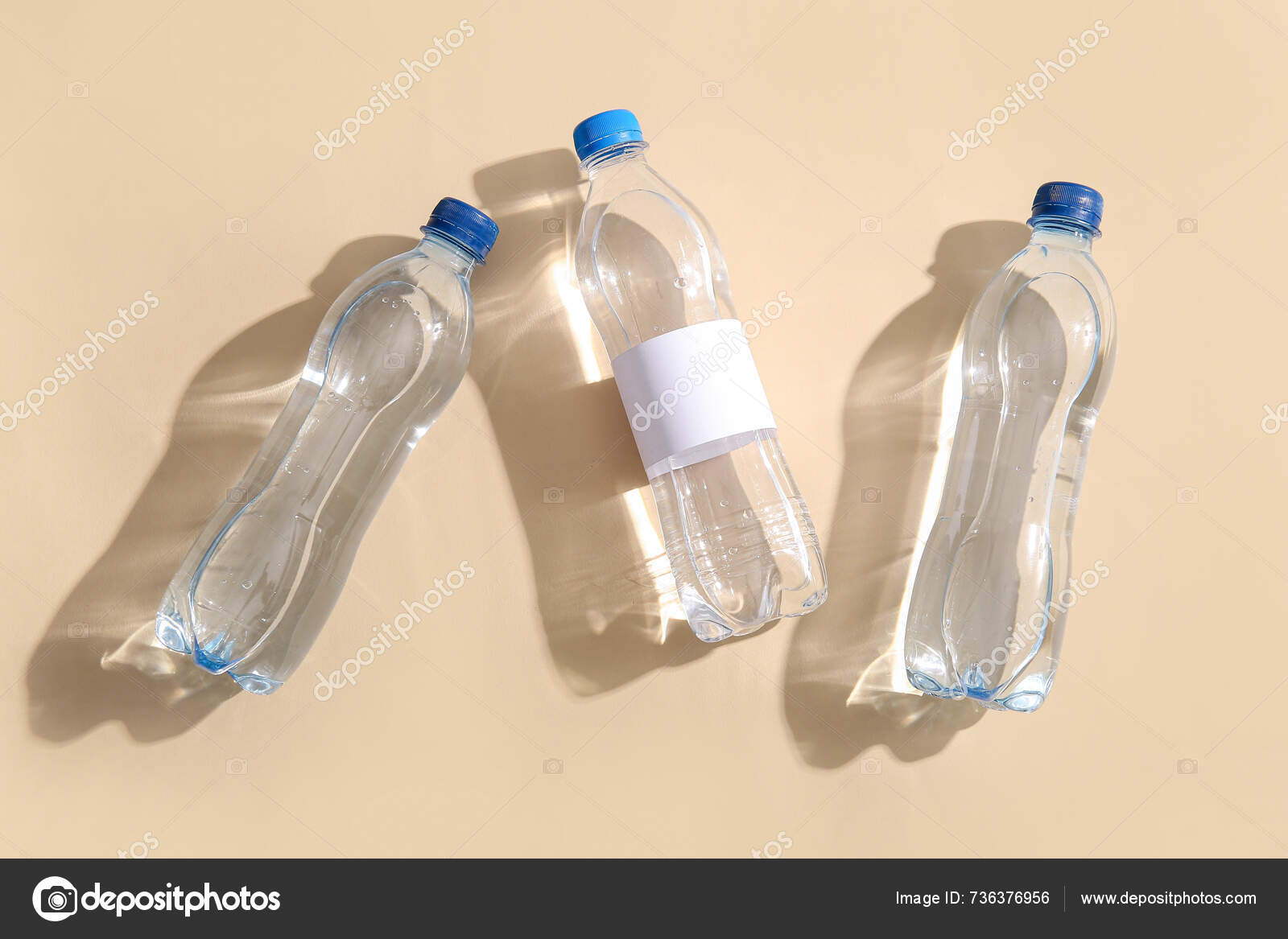 Bottles Clean Water Beige Background — Stock Photo © serezniy #736376956