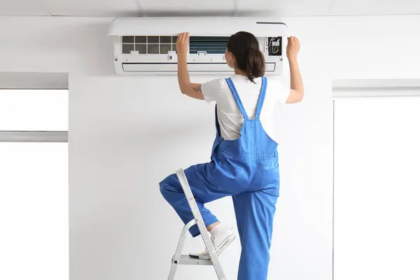 Air conditioner girl Stock Photos, Royalty Free Air conditioner girl ...