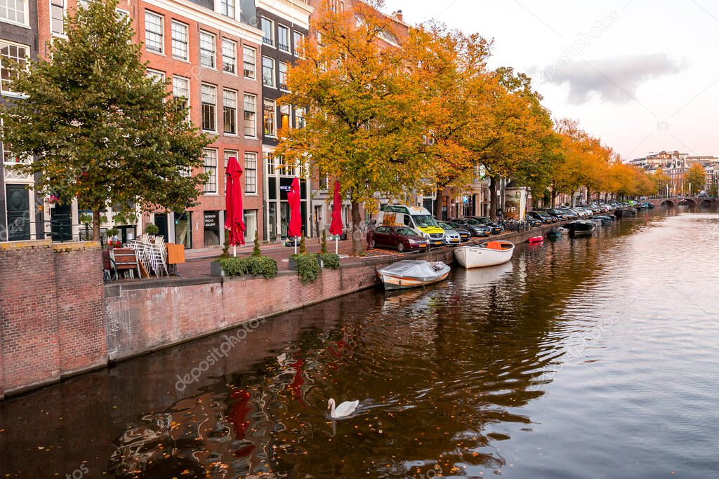Amsterdam, NL - October 12, 2021: Canals and typical dutch architecture ...
