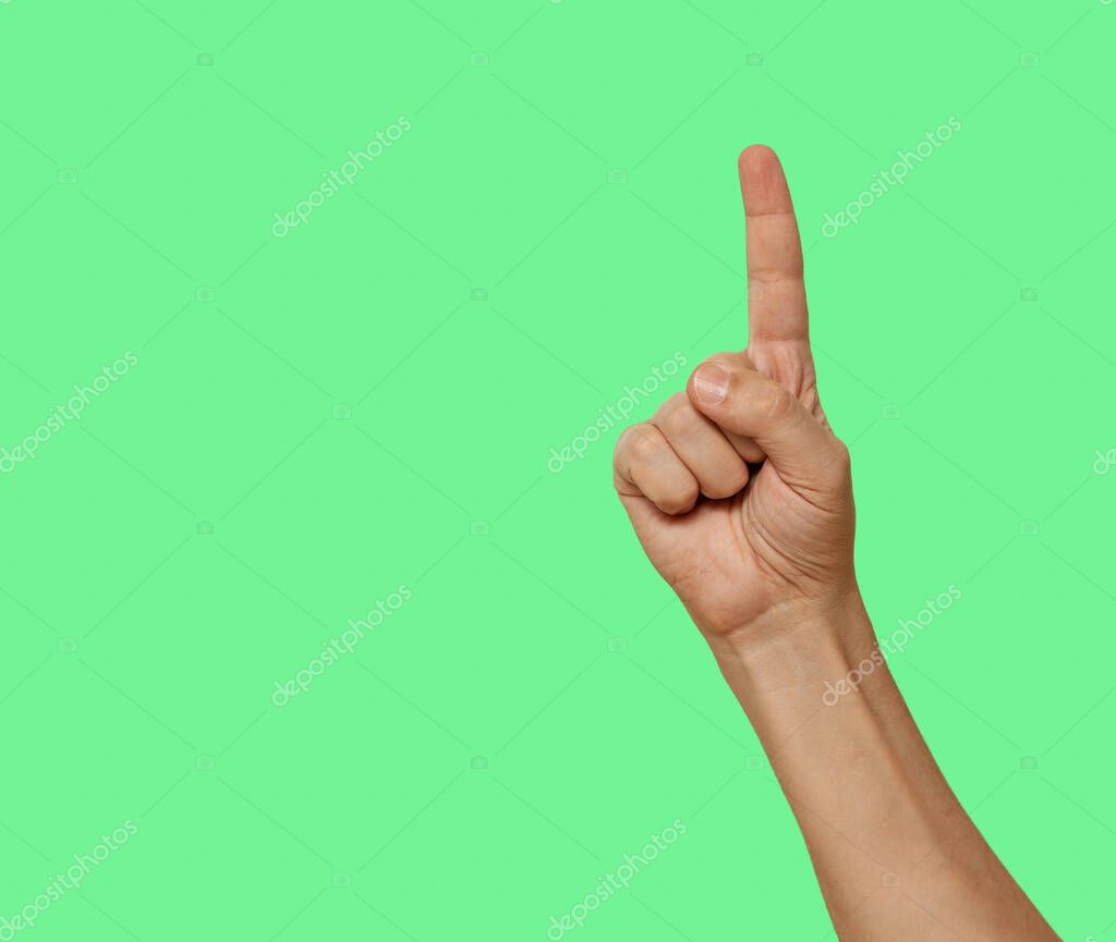 Bare hand with raised index finger on isolated on green chroma key ...