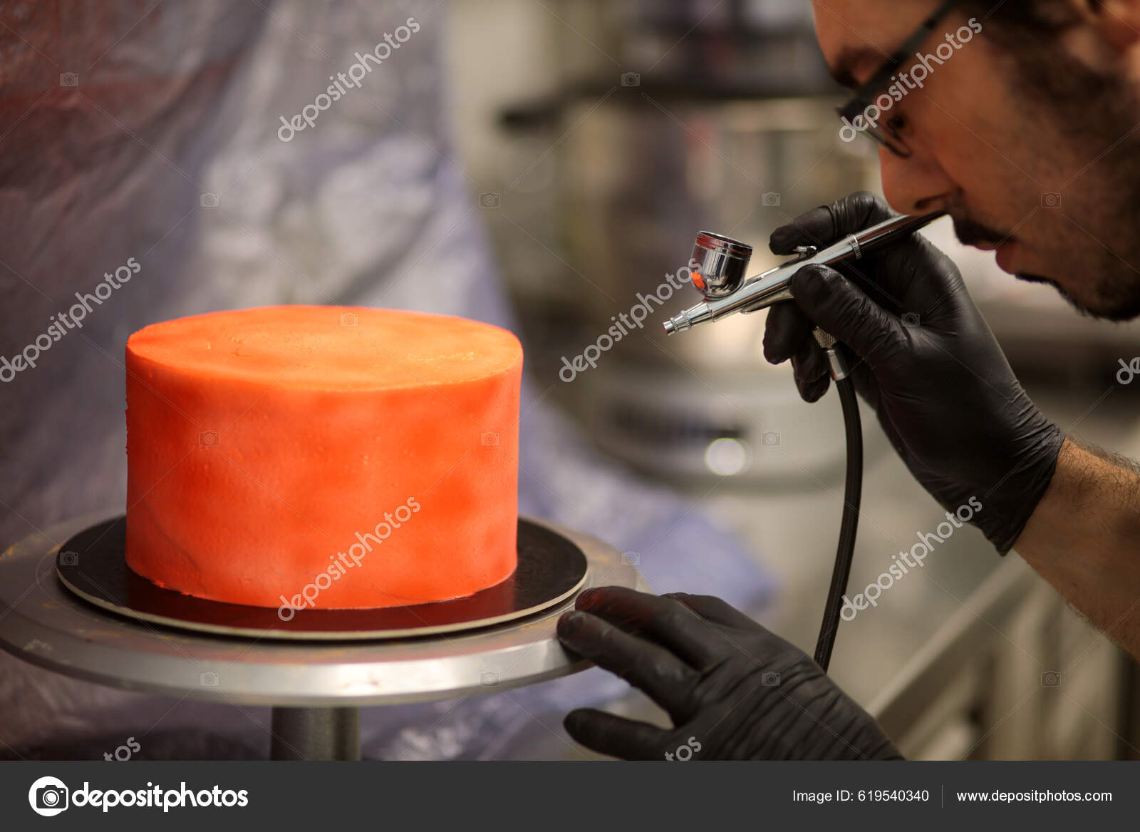 Cook Preparing Red Frosted Cake Using Air Bush — Stock Photo © columbo ...