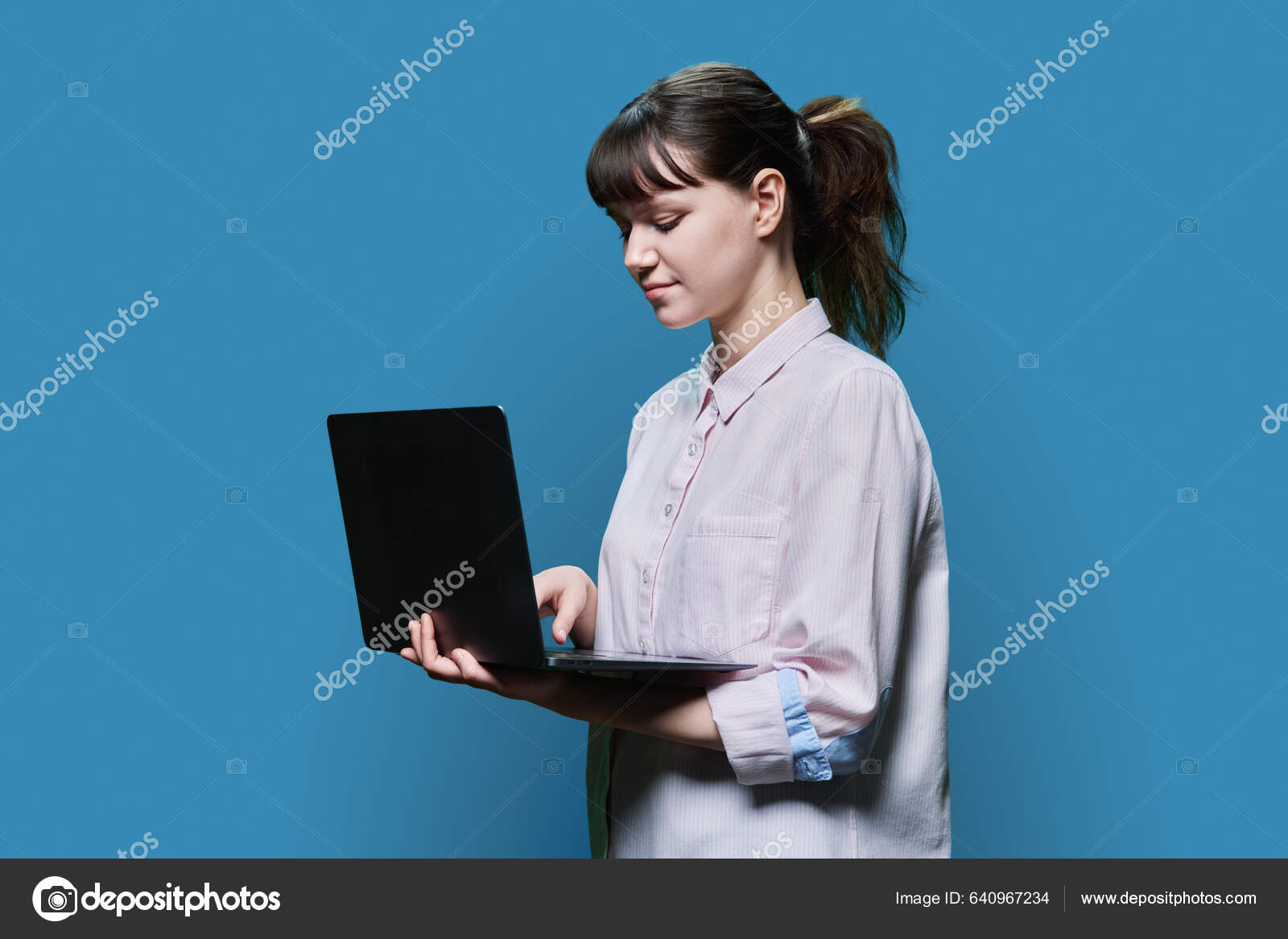 Serious Concentrated Female Student Looking Laptop Screen Blue Studio ...
