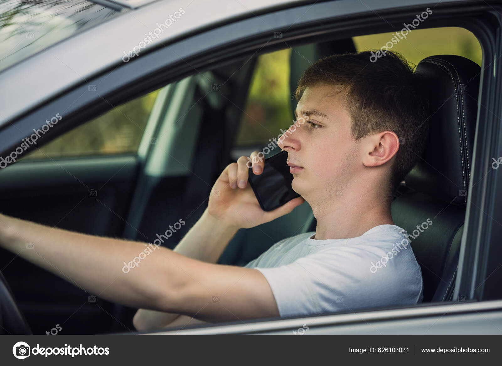 Young Man Unsafe Driving While Phone Talking Front Steering Wheel Stock ...
