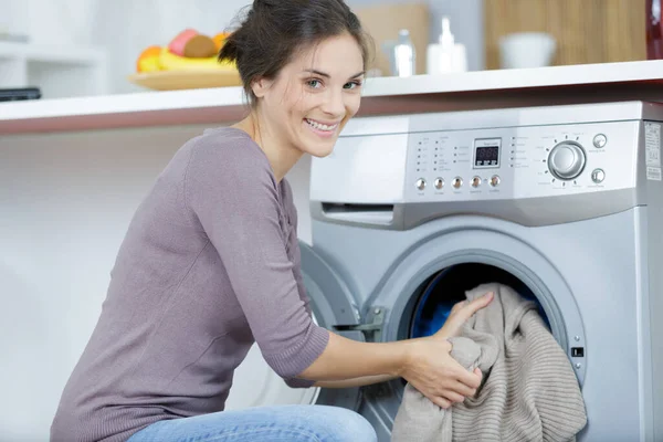 Women washing machine Stock Photos, Royalty Free Women washing machine ...