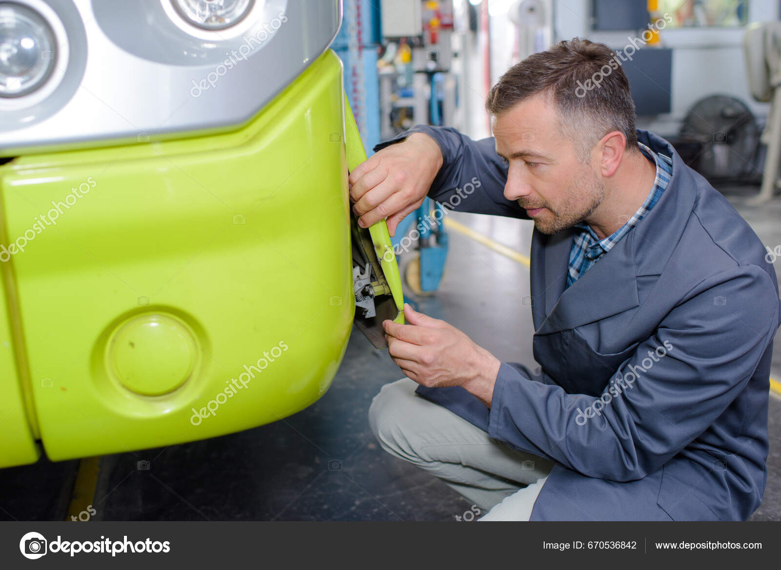 Man Fitting Fairing Bus — Stock Photo © photography33 #670536842