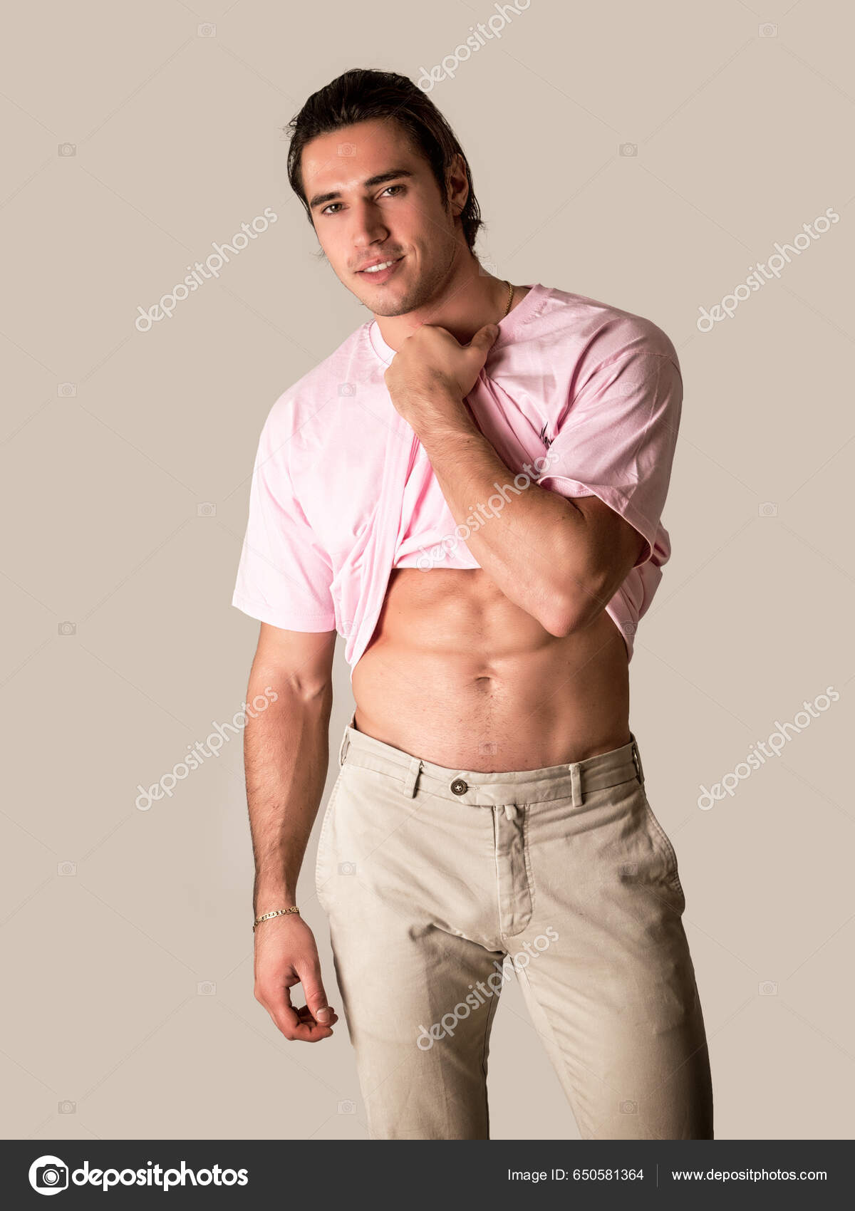 Handsome Muscular Fit Young Man Grey Background Looking Camera Pulling ...