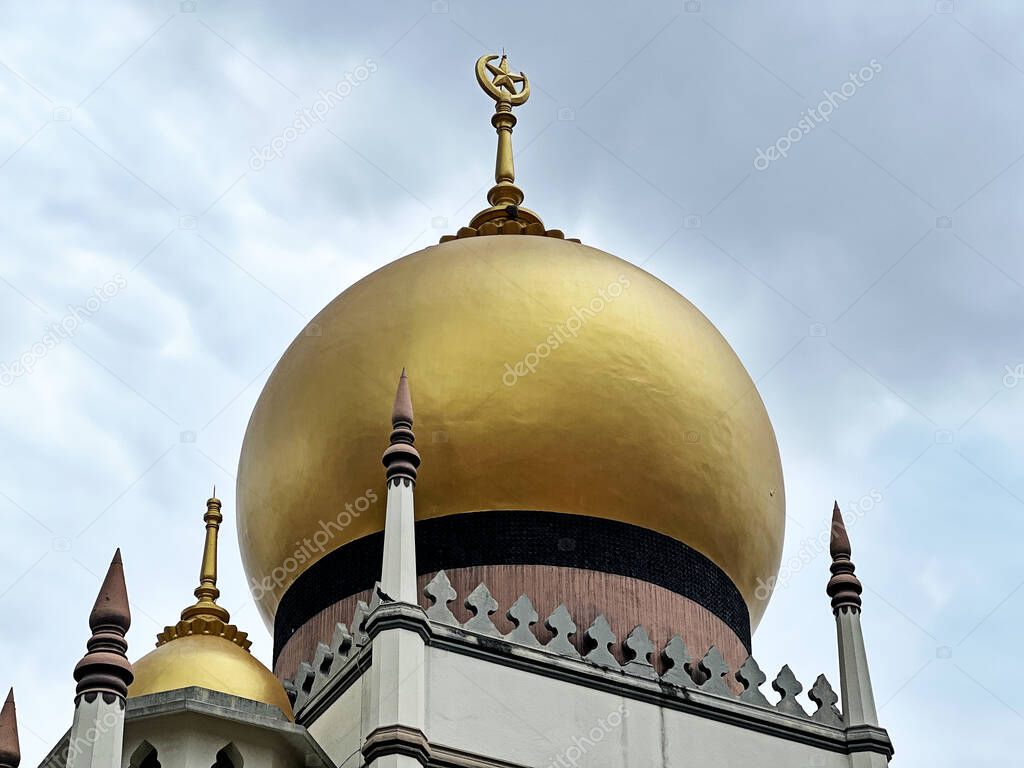 The Sultan Mosque in Singapore is topped with large dome covered in ...
