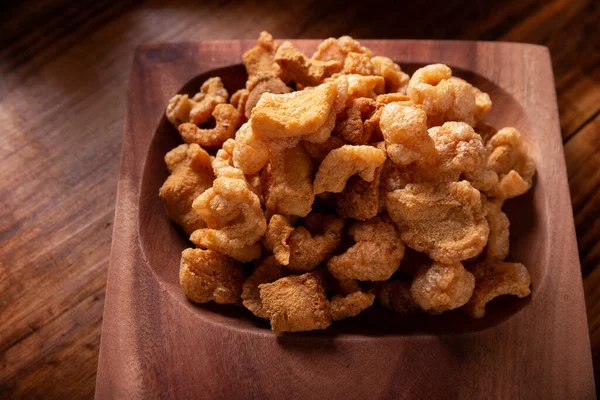 Comer Chicharrones
